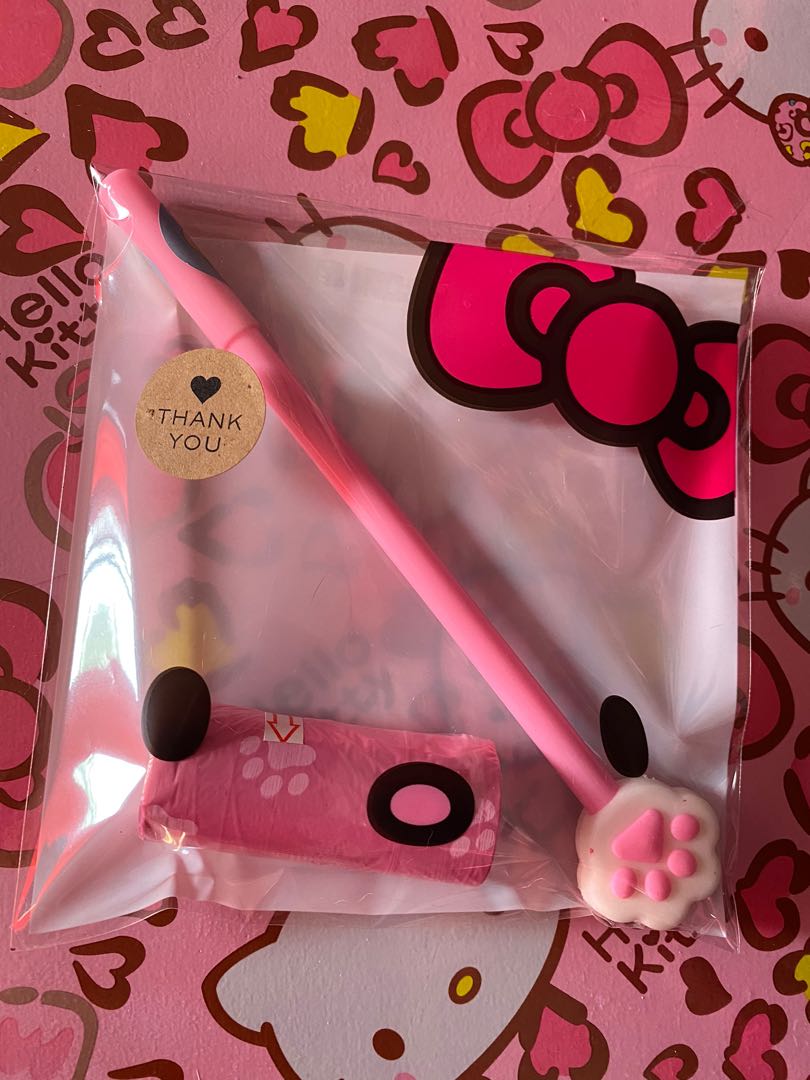 Paws gel pen and pink poop bag in hello kitty plastic pouch, Hobbies ...