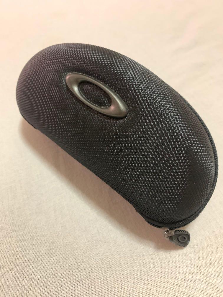 Oakley glasses case, Luxury, Bags & Wallets on Carousell