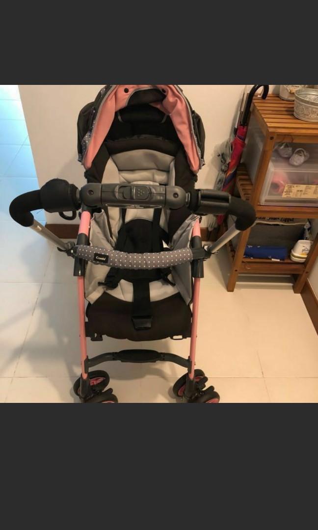 Combi pink stoller, Babies & Kids, Going Out, Strollers on Carousell