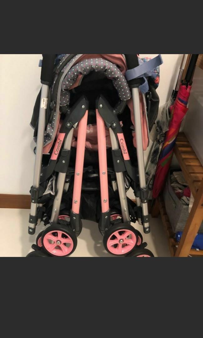 Combi pink stoller, Babies & Kids, Going Out, Strollers on Carousell