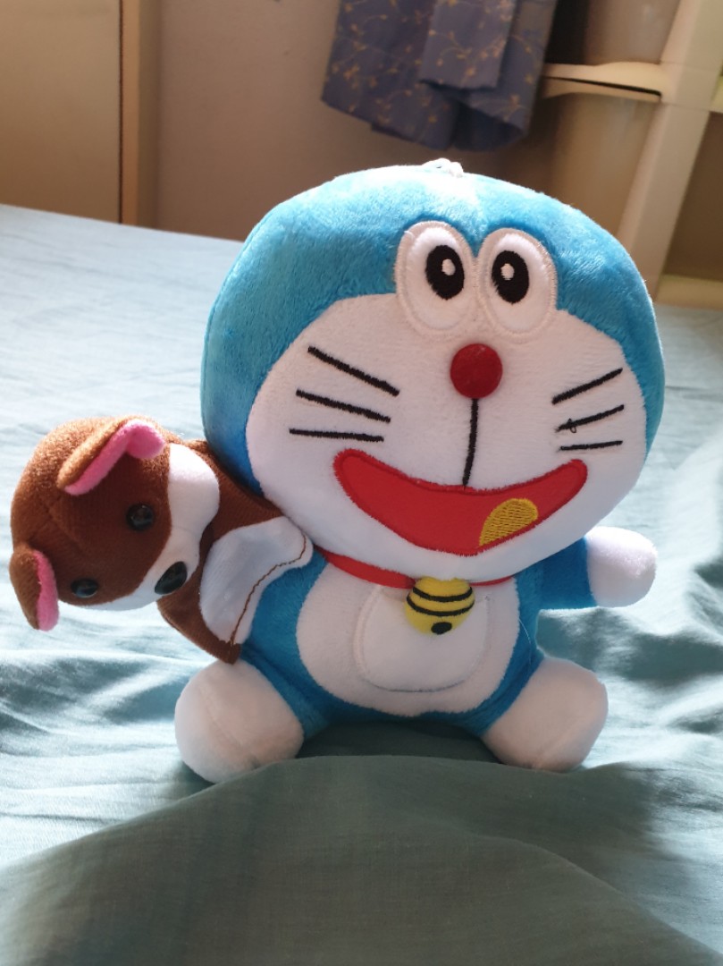 Doraemon with puppet, Toys & Games, Stuffed Toys on Carousell