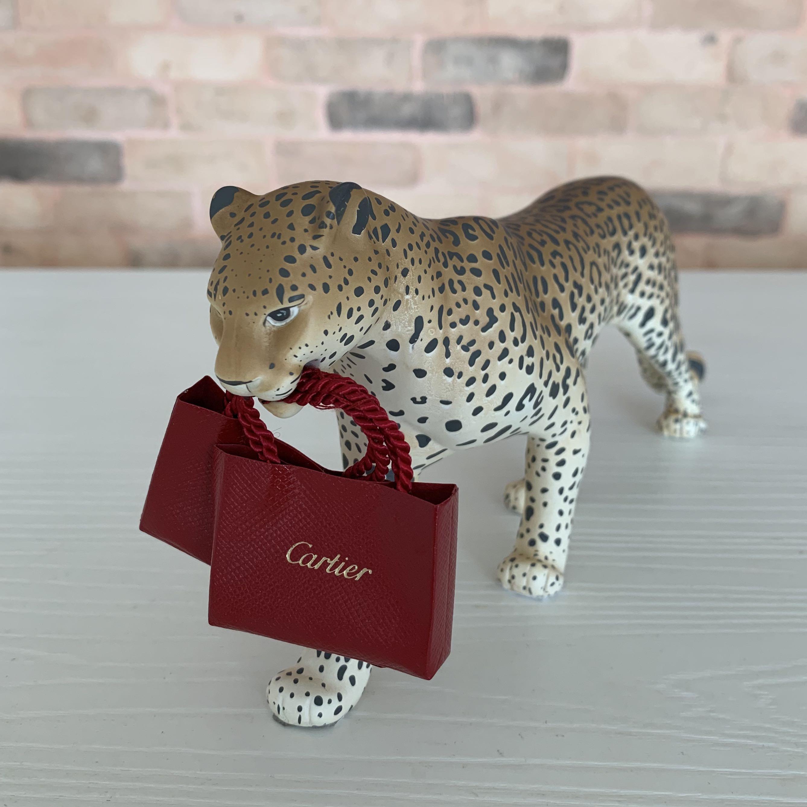 Cartier leopard display, Luxury, Accessories on Carousell