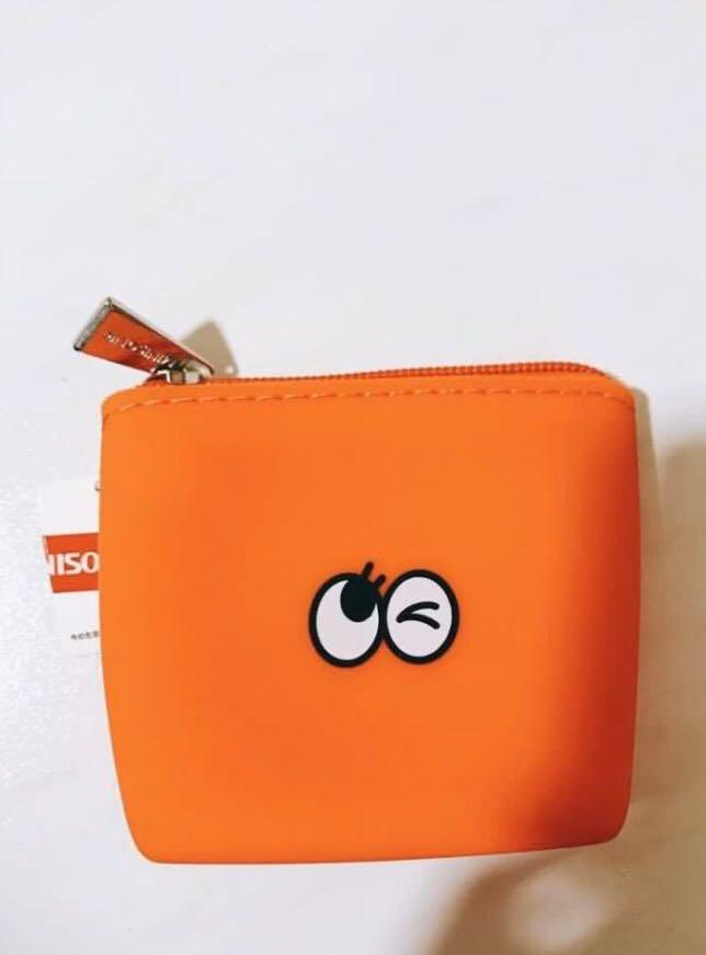Miniso winking eye silicone Coin Pouch / purse with zip (orange), Women ...