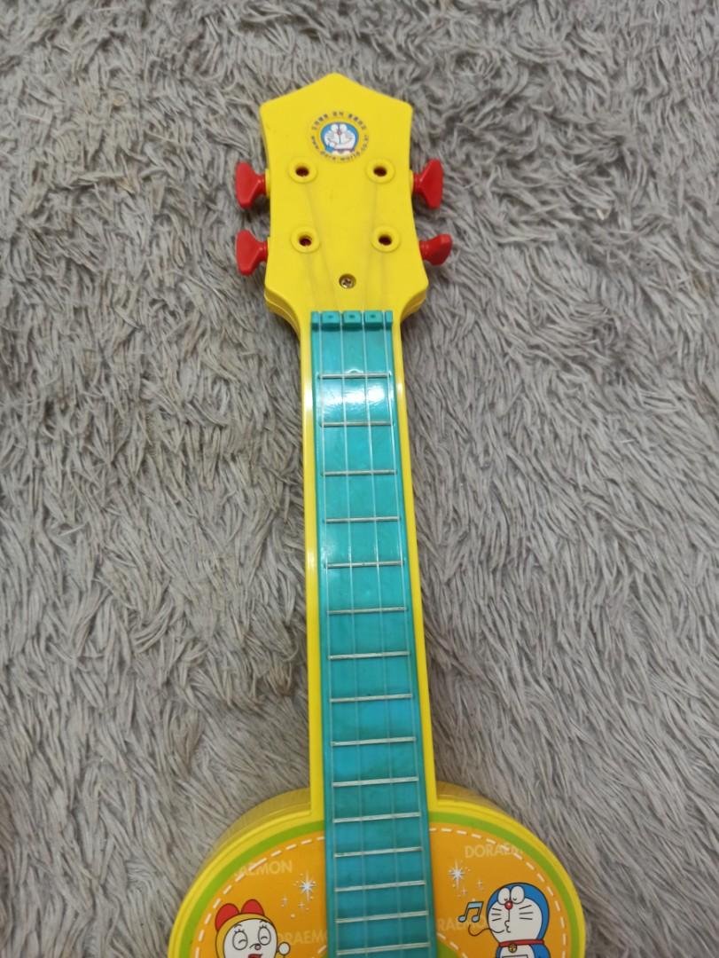 Doraemon Musical Guitar Toy, Babies & Kids, Infant Playtime on Carousell
