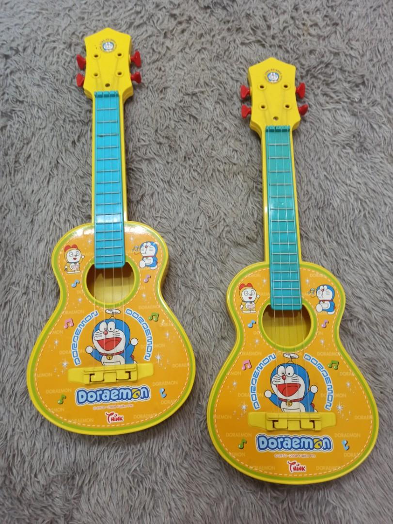 Doraemon Musical Guitar Toy, Babies & Kids, Infant Playtime on Carousell