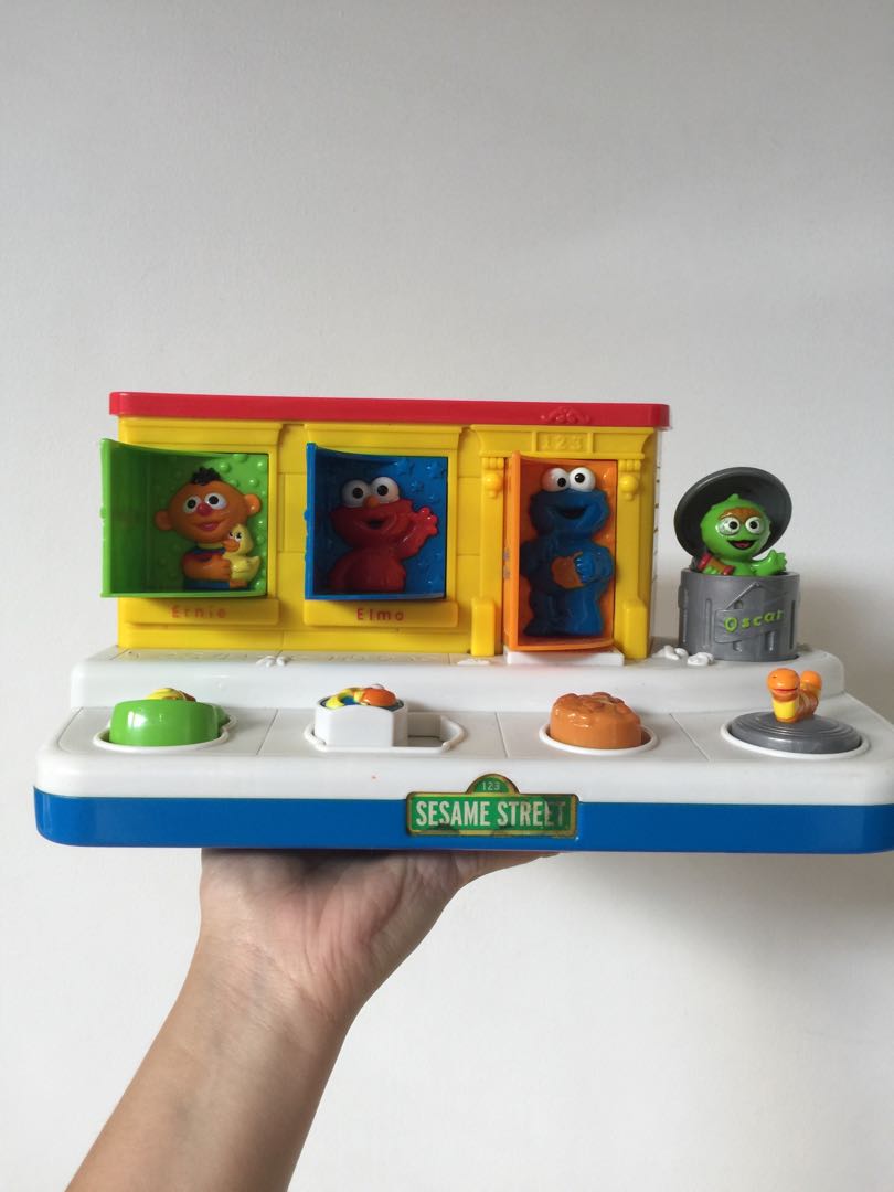 Defective Elmo sensory push button toy, Babies & Kids, Infant Playtime ...