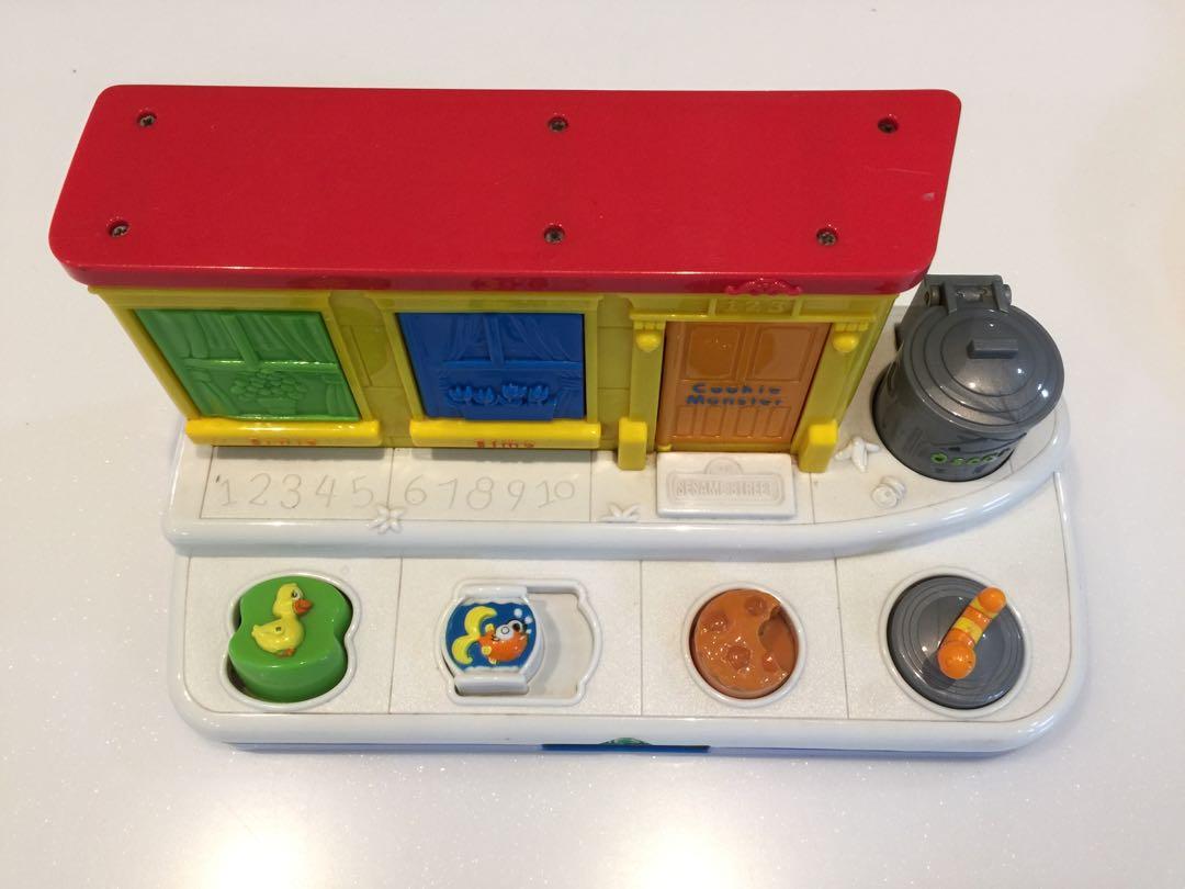 Defective Elmo sensory push button toy, Babies & Kids, Infant Playtime ...