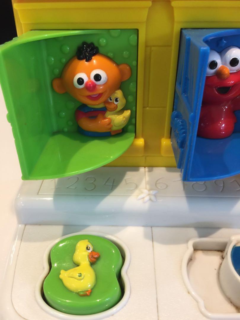 Defective Elmo sensory push button toy, Babies & Kids, Infant Playtime ...