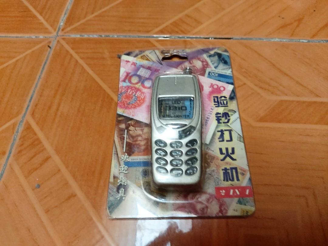 Korek api (HP) dan tempat rokok (A) dan keduanya (GG), Barang Yang ...