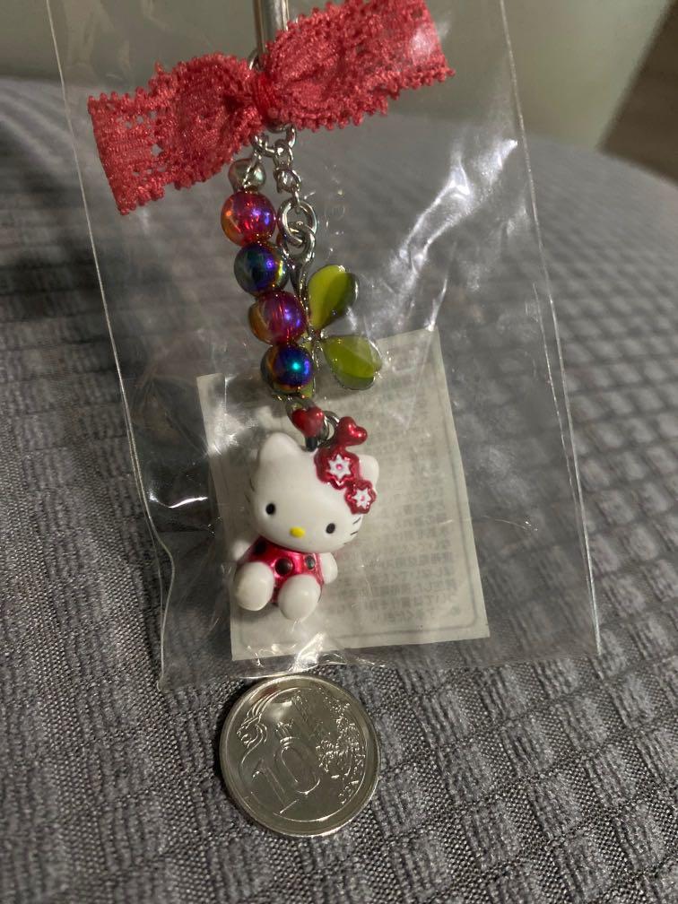Hello Kitty Clover leaf charm, Hobbies & Toys, Toys & Games on Carousell