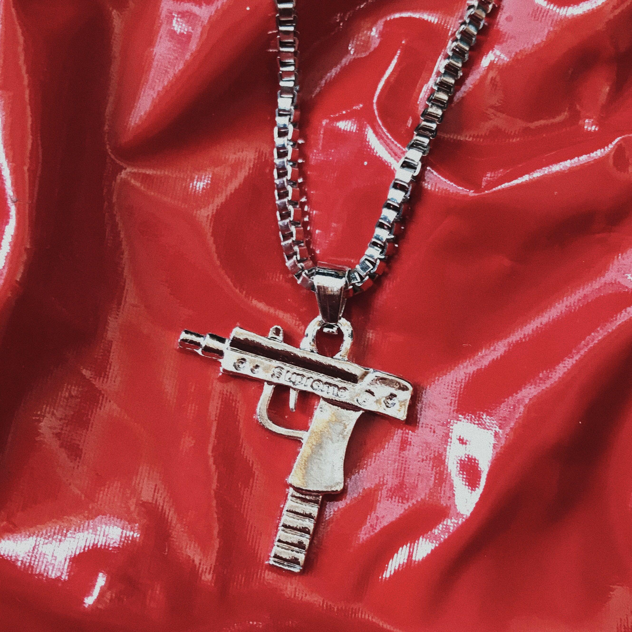 Supreme Uzi Gun Necklace, Men's Fashion, Watches & Accessories, Cuff ...