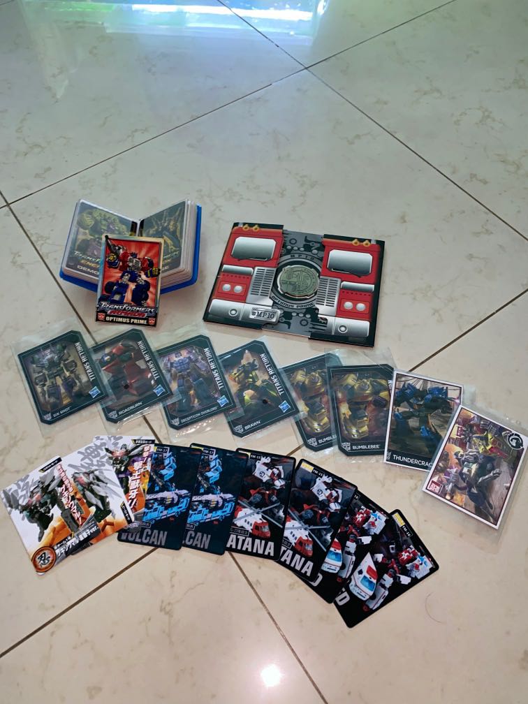 Transformer mp10 coin and some cards, Hobbies & Toys, Toys & Games on ...