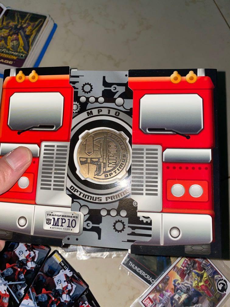 Transformer mp10 coin and some cards, Hobbies & Toys, Toys & Games on ...