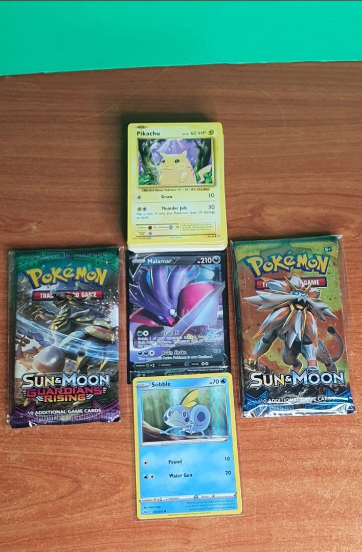 Pokemon Card bundle.( 3 packs,40 random cards,1 holo card and 1 ultra ...