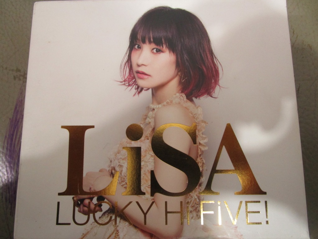 鬼滅 LiSA - LUCKY Hi FiVE! 日初回限定盤 CD+DVD+BD+相集寫真, 興趣及遊戲, 音樂、樂器 & 配件, 音樂與媒體 - CD 及 DVD - Carousell