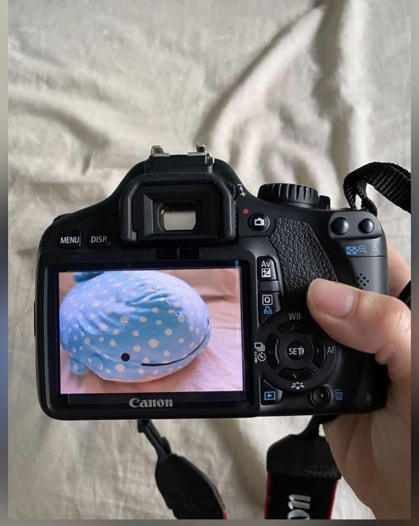 Canon 550 DSLR with prime lens, Photography, Cameras on Carousell