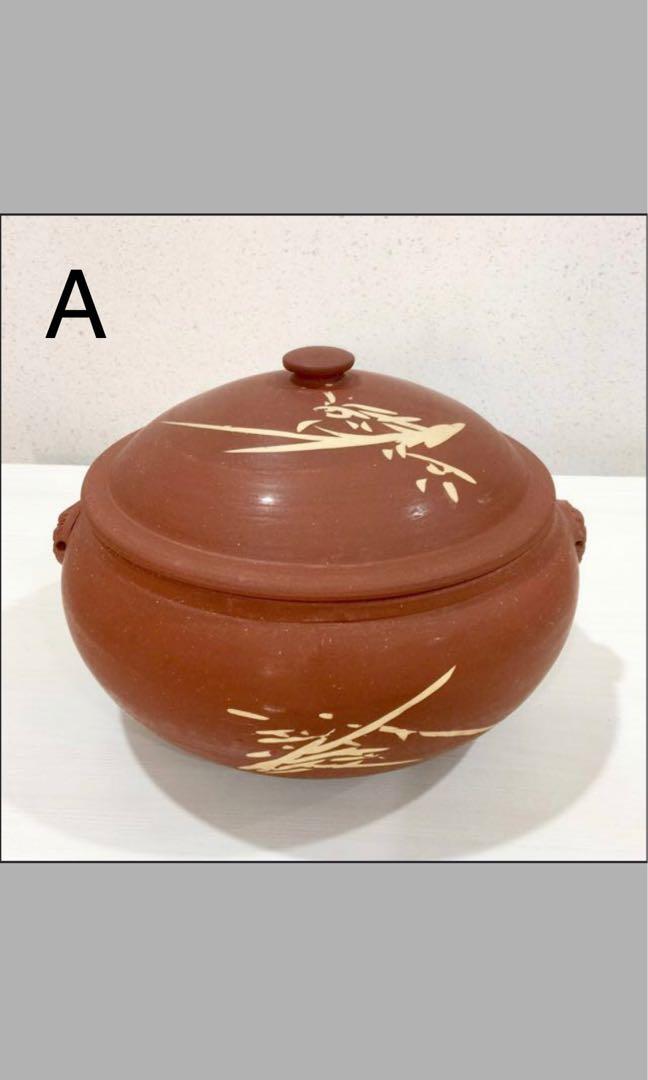 A. Yunan Funnel Steaming Pot B. 8" Ceramic Casserole C. 7” Ceramic ...