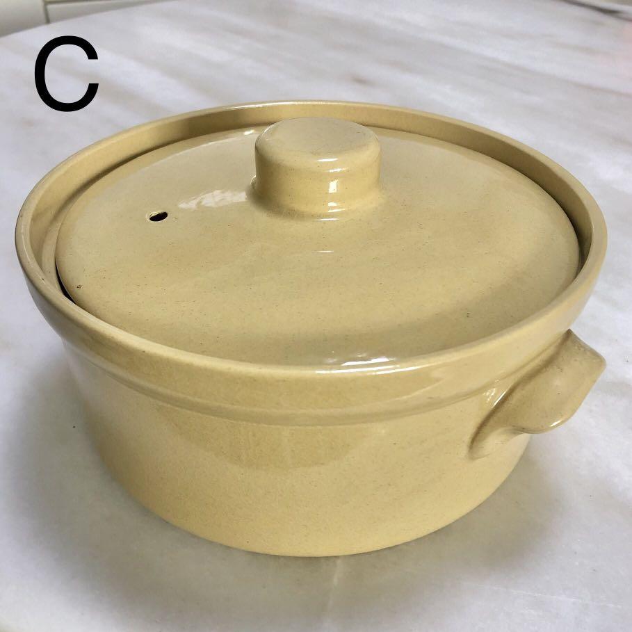 A. Yunan Funnel Steaming Pot B. 8" Ceramic Casserole C. 7” Ceramic ...