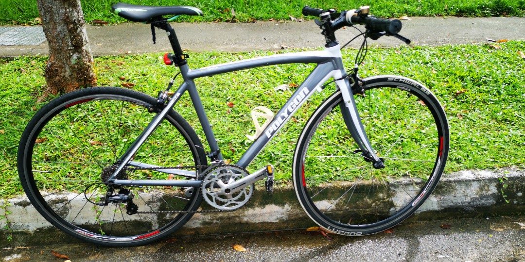 Polygon helios 3.0 hybrid Road bike Shimano sora, Sports Equipment ...