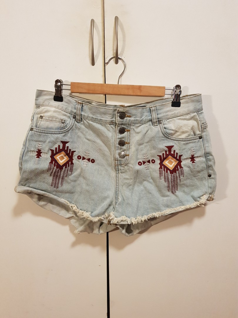 Semi high waist denim shorts with tribal design details, Women's ...