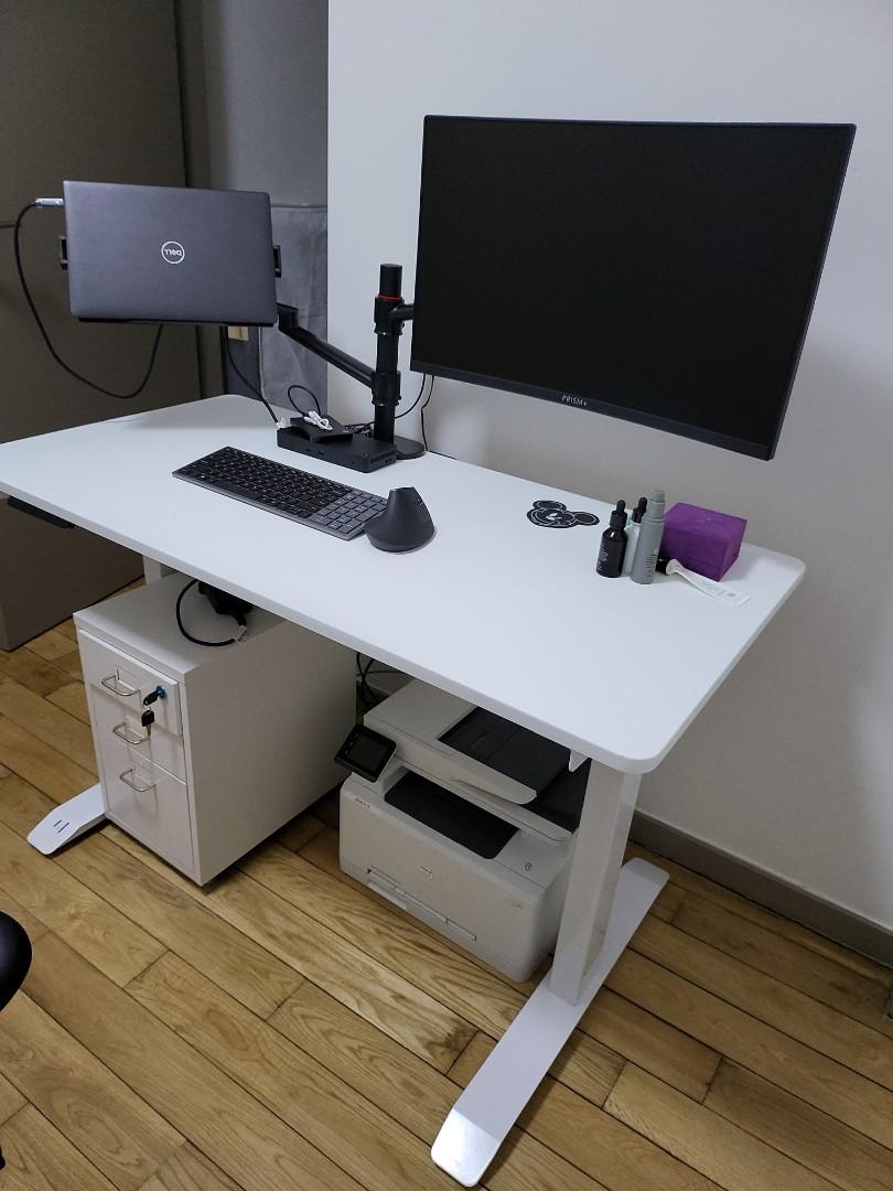 Electronic Study Table 60cm by 100cm. The table can be adjusted to ...