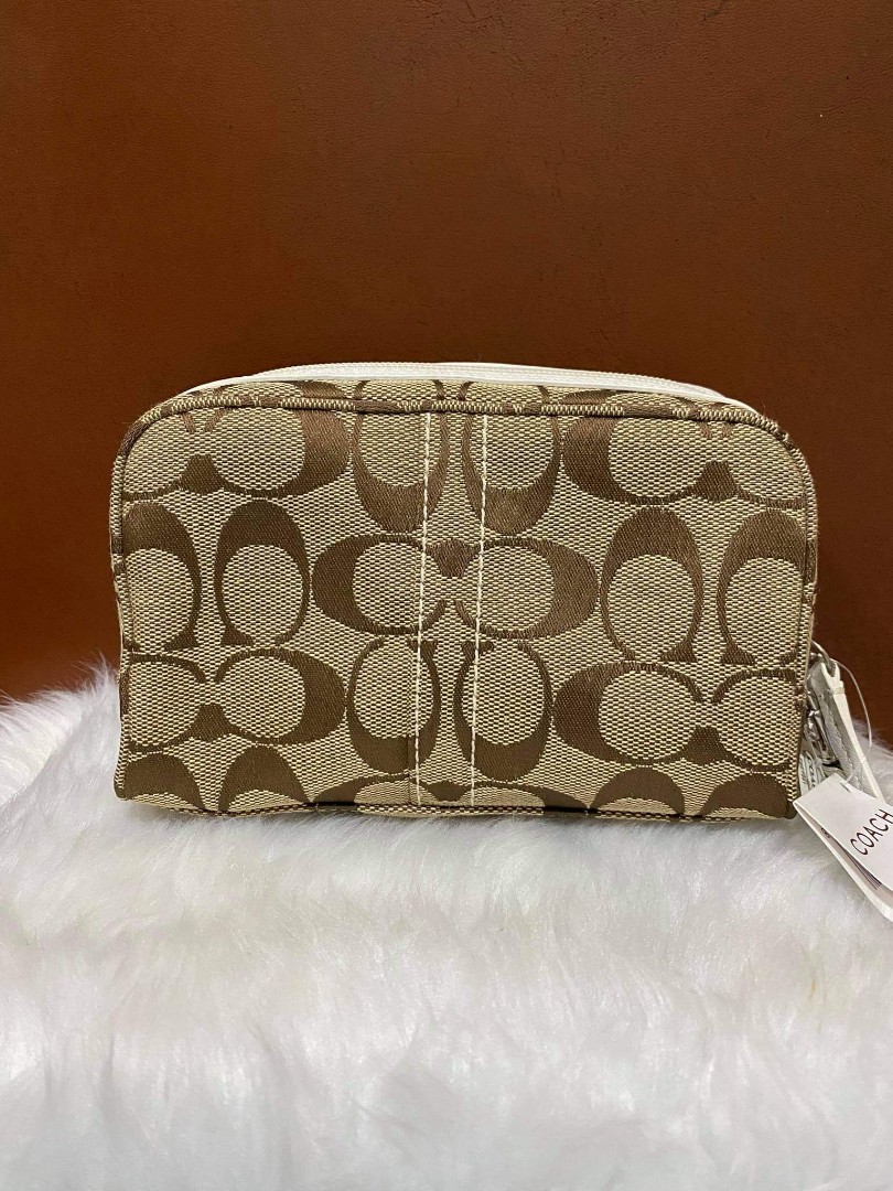 Coach pouch, Luxury, Bags & Wallets on Carousell