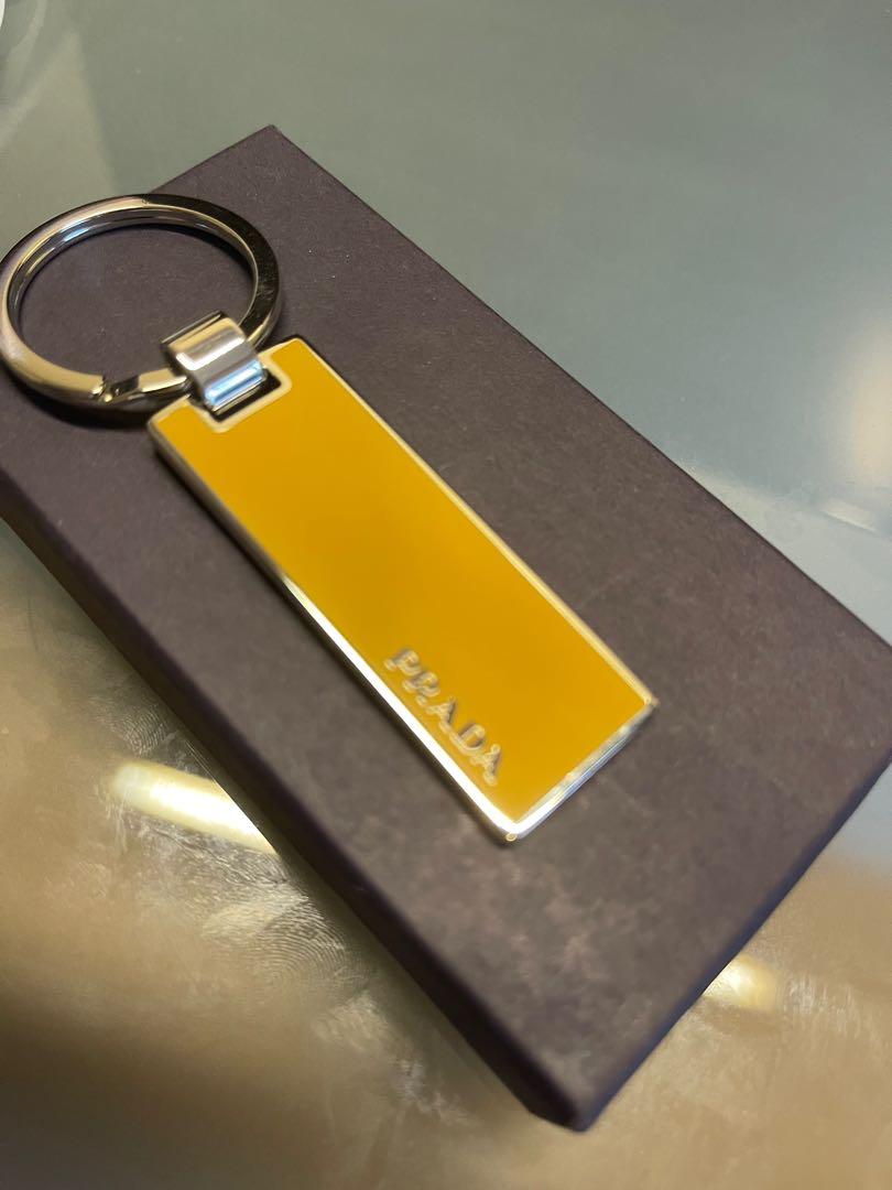 Prada key ring - mustard Color, Luxury, Accessories on Carousell