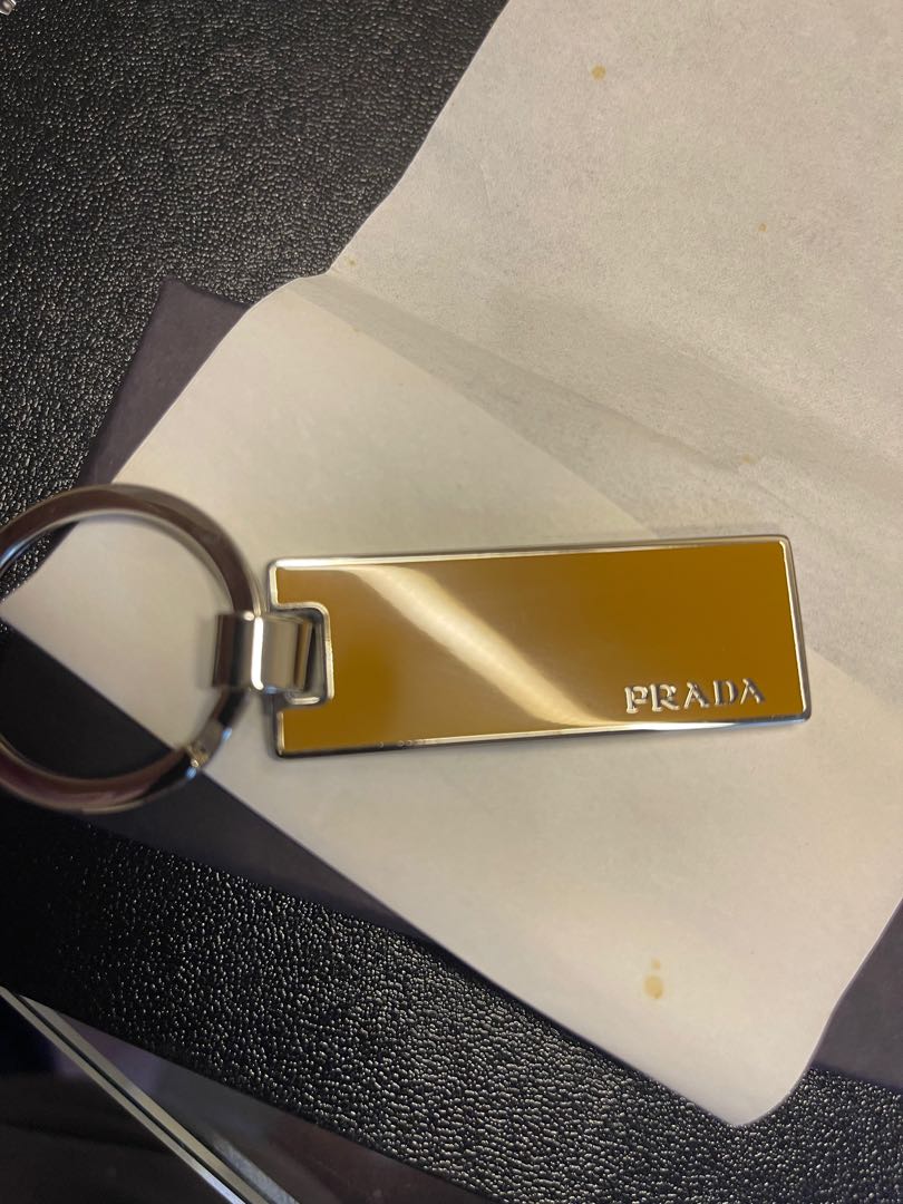 Prada key ring - mustard Color, Luxury, Accessories on Carousell