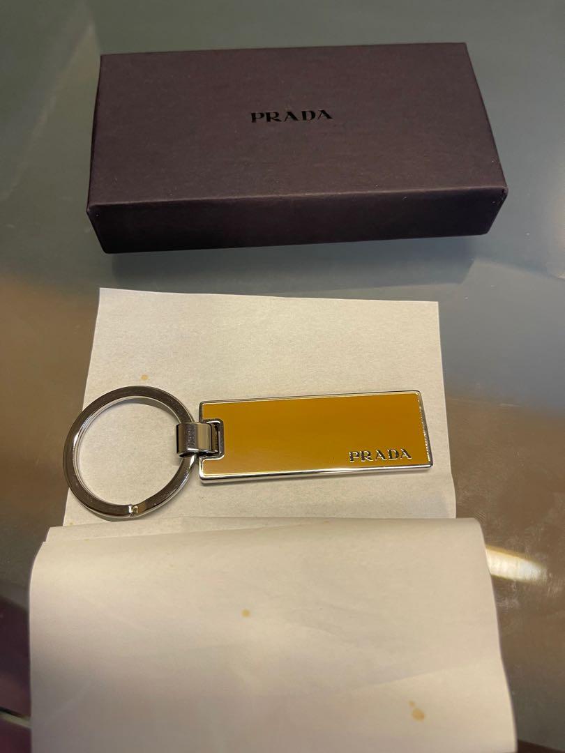Prada key ring - mustard Color, Luxury, Accessories on Carousell