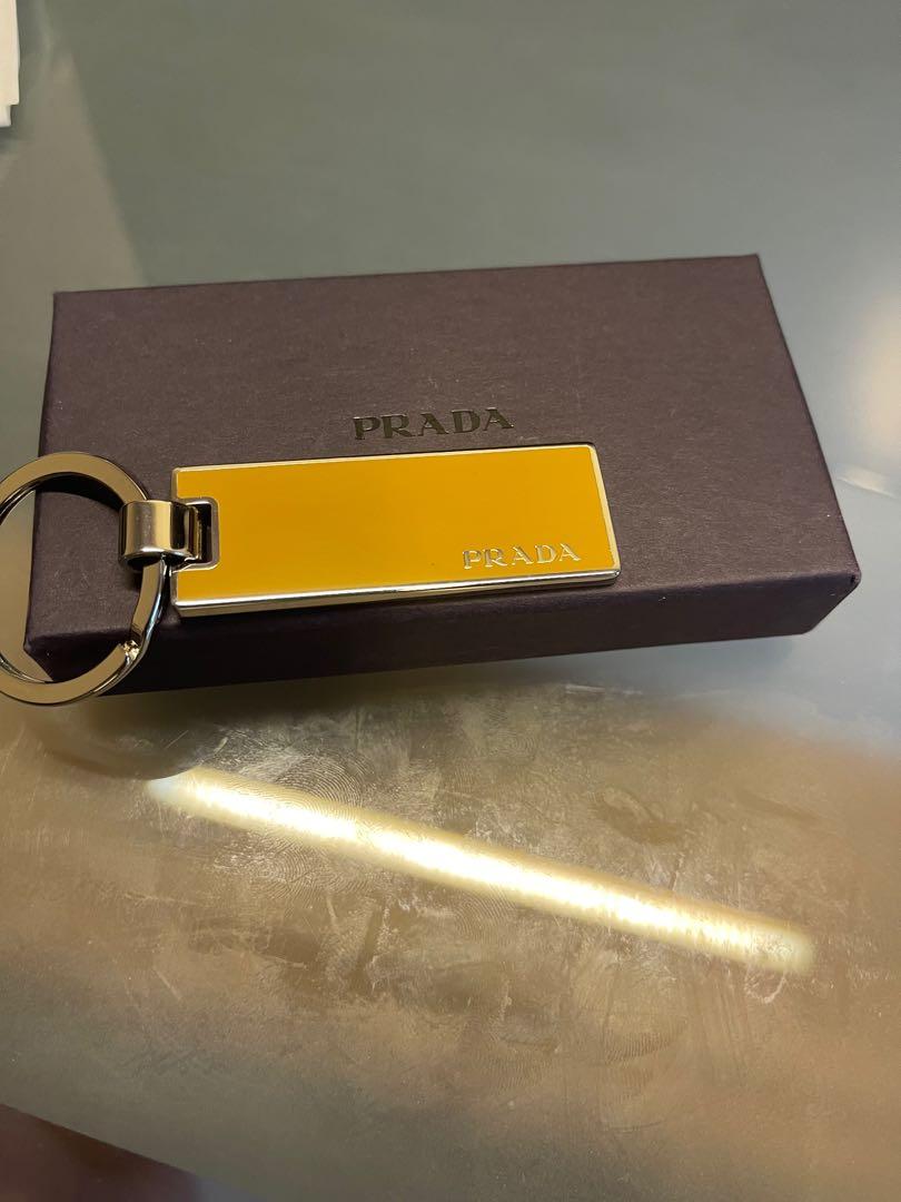 Prada key ring - mustard Color, Luxury, Accessories on Carousell