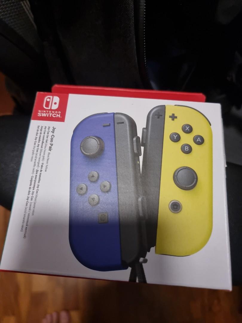 BNIB Nintendo switch joycons blue/neon yellow - Local Warranty, Video ...