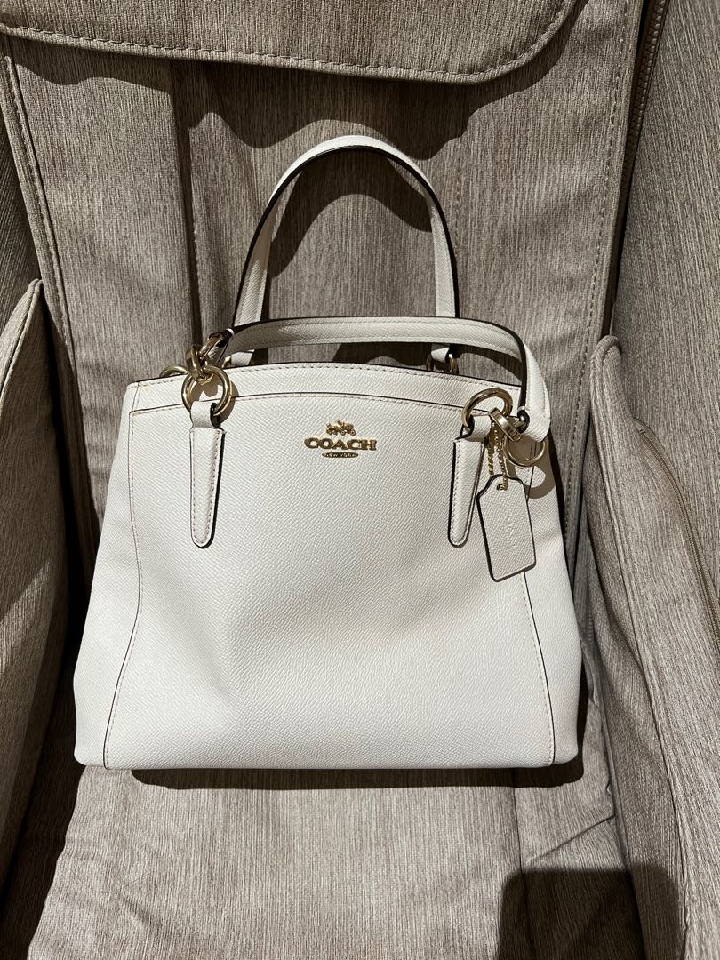 Coach white bag, Women's Fashion, Bags & Wallets, Clutches on Carousell