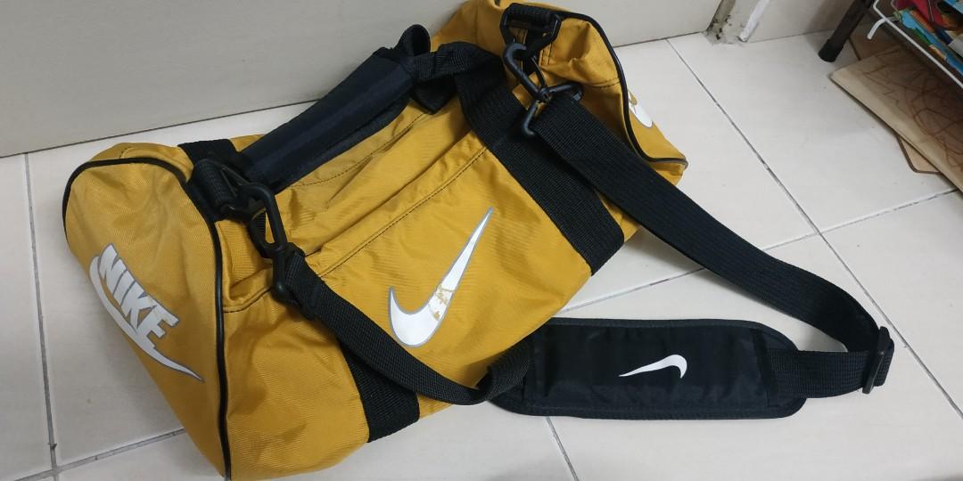 nike kuning harimau malaya' duffle bag vintage, Men's Fashion, Bags ...