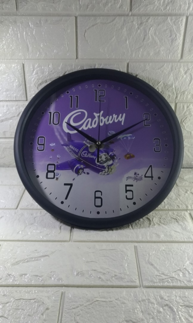 Cadbury Wallclock, Furniture & Home Living, Home Decor, Clocks on Carousell