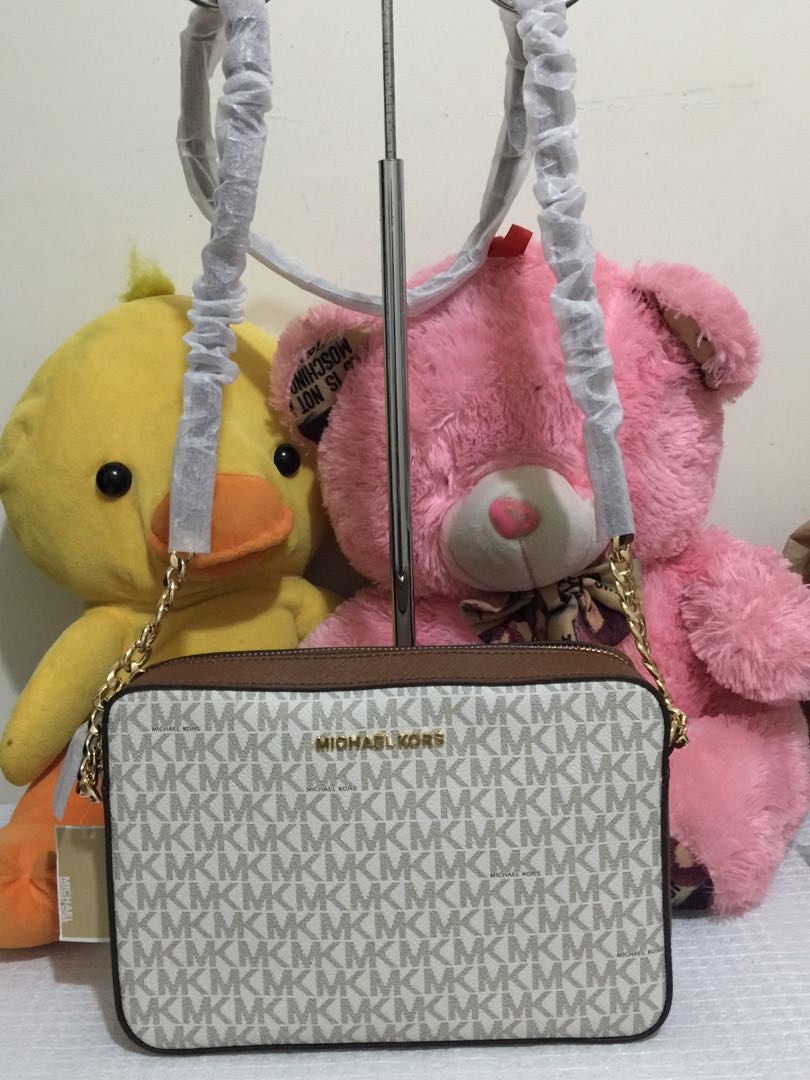 Mk sling, Women's Fashion, Bags & Wallets, Cross-body Bags on Carousell