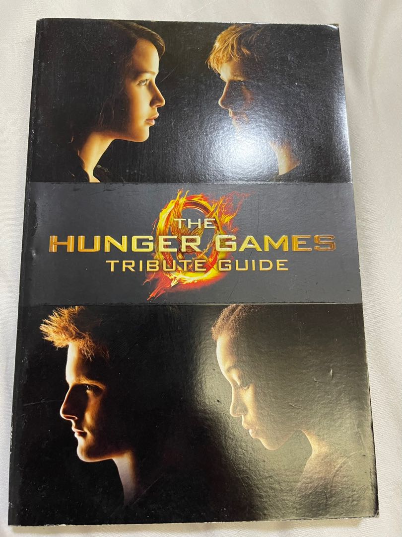 THE HUNGER GAMES TRIBUTE GUIDE, Hobbies & Toys, Books & Magazines ...