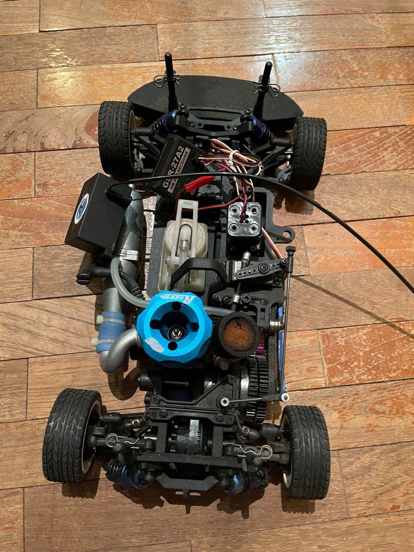Old GS racing RC car skeleton and remote. Probably needs fixing ...