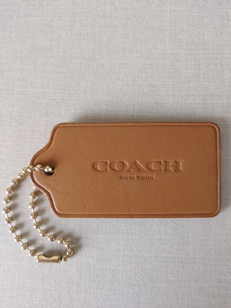 Lost & Found Coach Name Tag Regina, Luxury, Accessories on Carousell