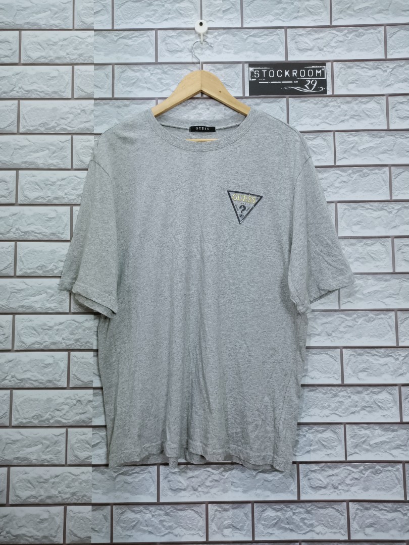 Guess triangle logo on chest (Authentic), Luxury, Apparel on Carousell