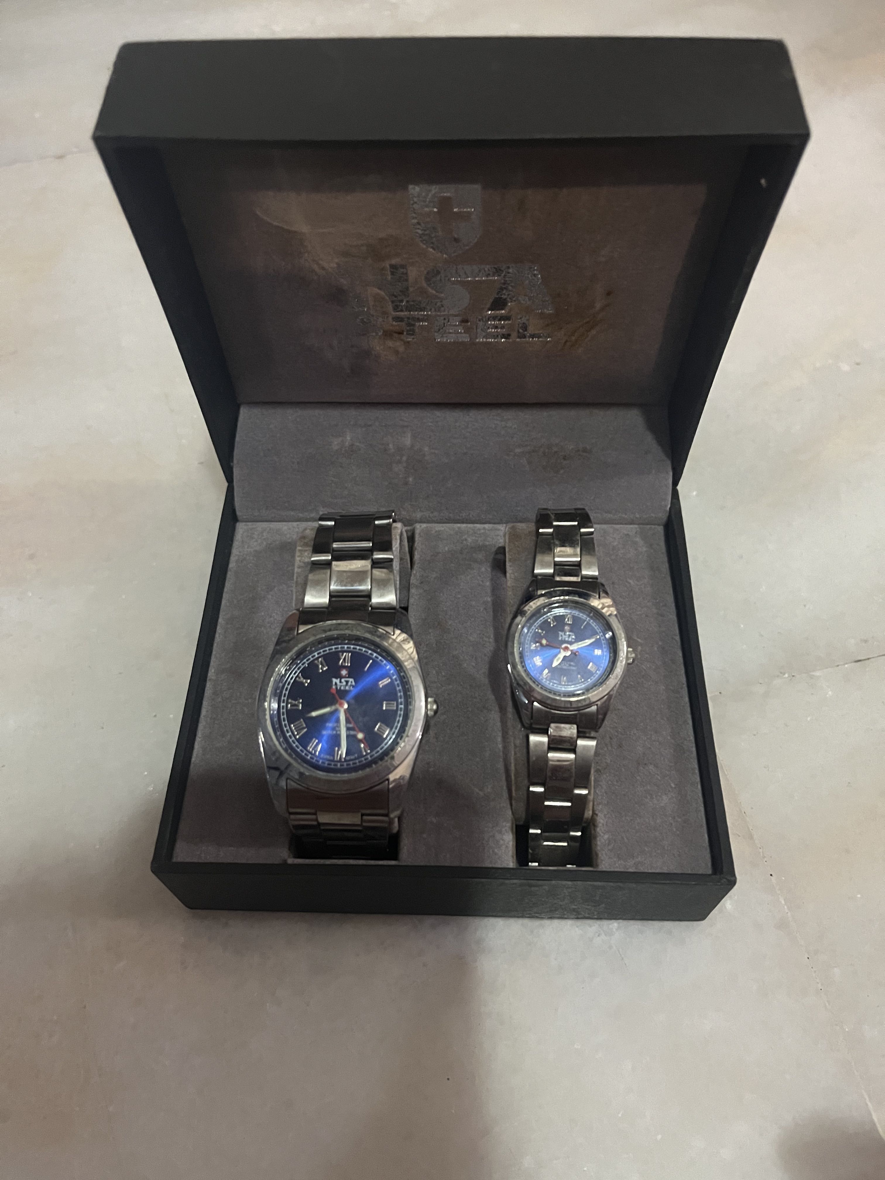 NSA steel quartz couple watch, Luxury, Watches on Carousell
