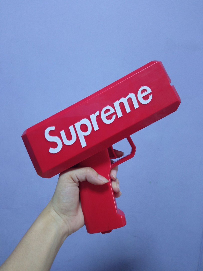 Supreme money gun, Hobbies & Toys, Toys & Games on Carousell