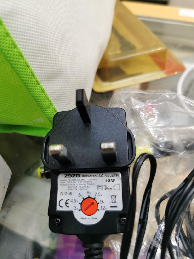ZOZO 12W AC Universal Adapter IP 100-240V 0.5A 50/60Hz OP 3V 2A/4.5V 2A/5V 2A/6V 1.5A/7.5V 1.5A ...