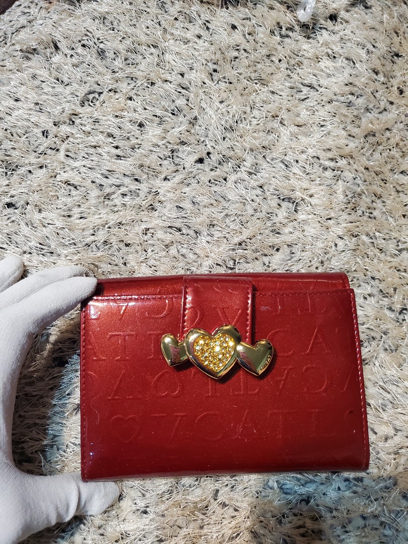 Lovcat trifold wallet, Luxury, Bags & Wallets on Carousell