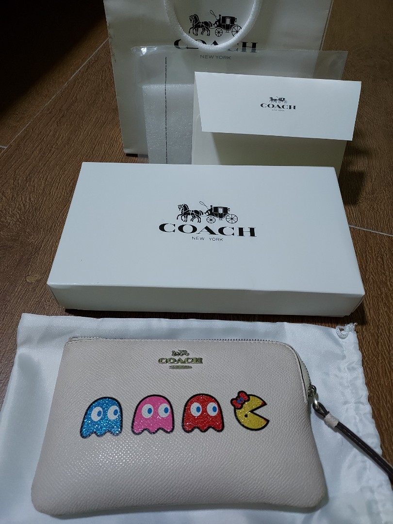 Coach Leather Wristlet X Pac-man, Luxury, Bags & Wallets on Carousell