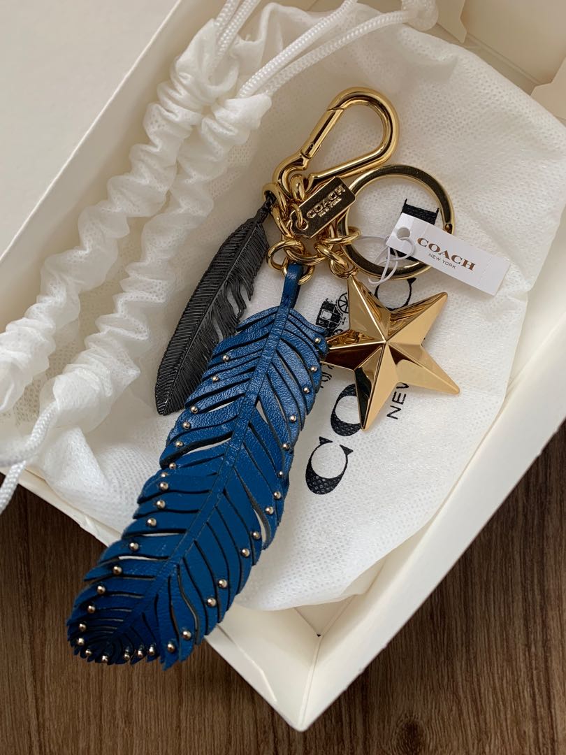 COACH royal blue feather bag charm, Women's Fashion, Watches ...
