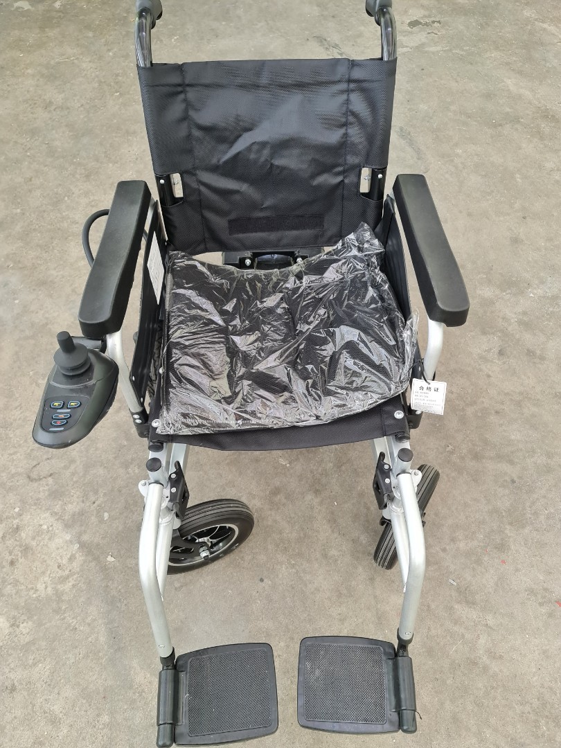 Branded new self driving electric wheelchair / adjustable back ...