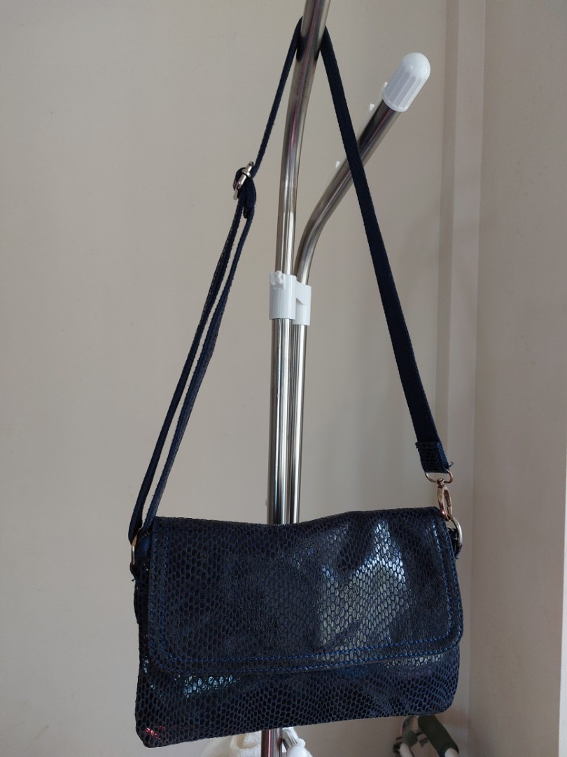 Animal skin sling with 7 compartments, Women's Fashion, Bags & Wallets ...