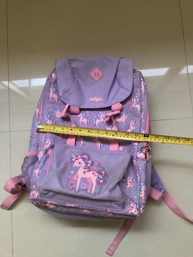 Snuggle backpack, Women's Fashion, Bags & Wallets, Backpacks on Carousell