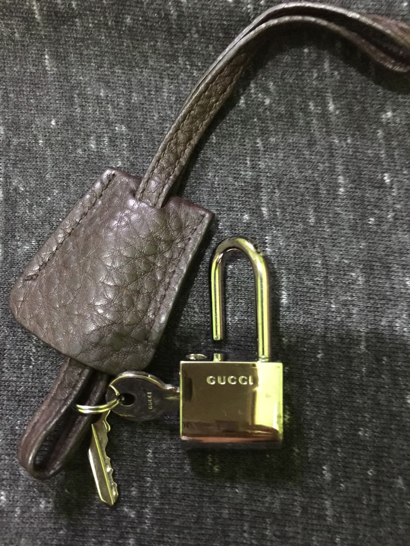 Gucci Lock and Key, Luxury, Bags & Wallets on Carousell