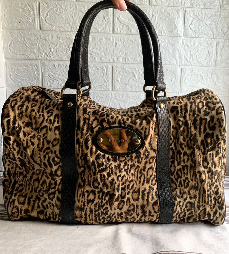 Evada leopard boston bag, Luxury, Bags & Wallets on Carousell